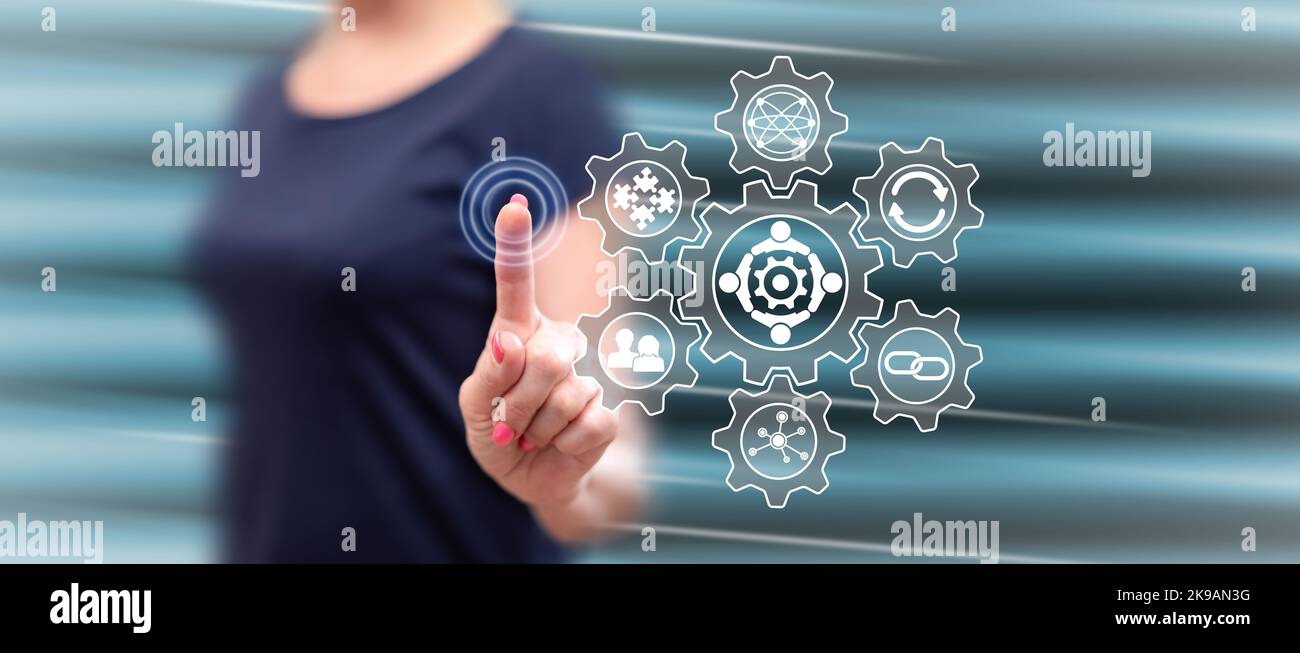Woman touching a business relationship concept on a touch screen with ...