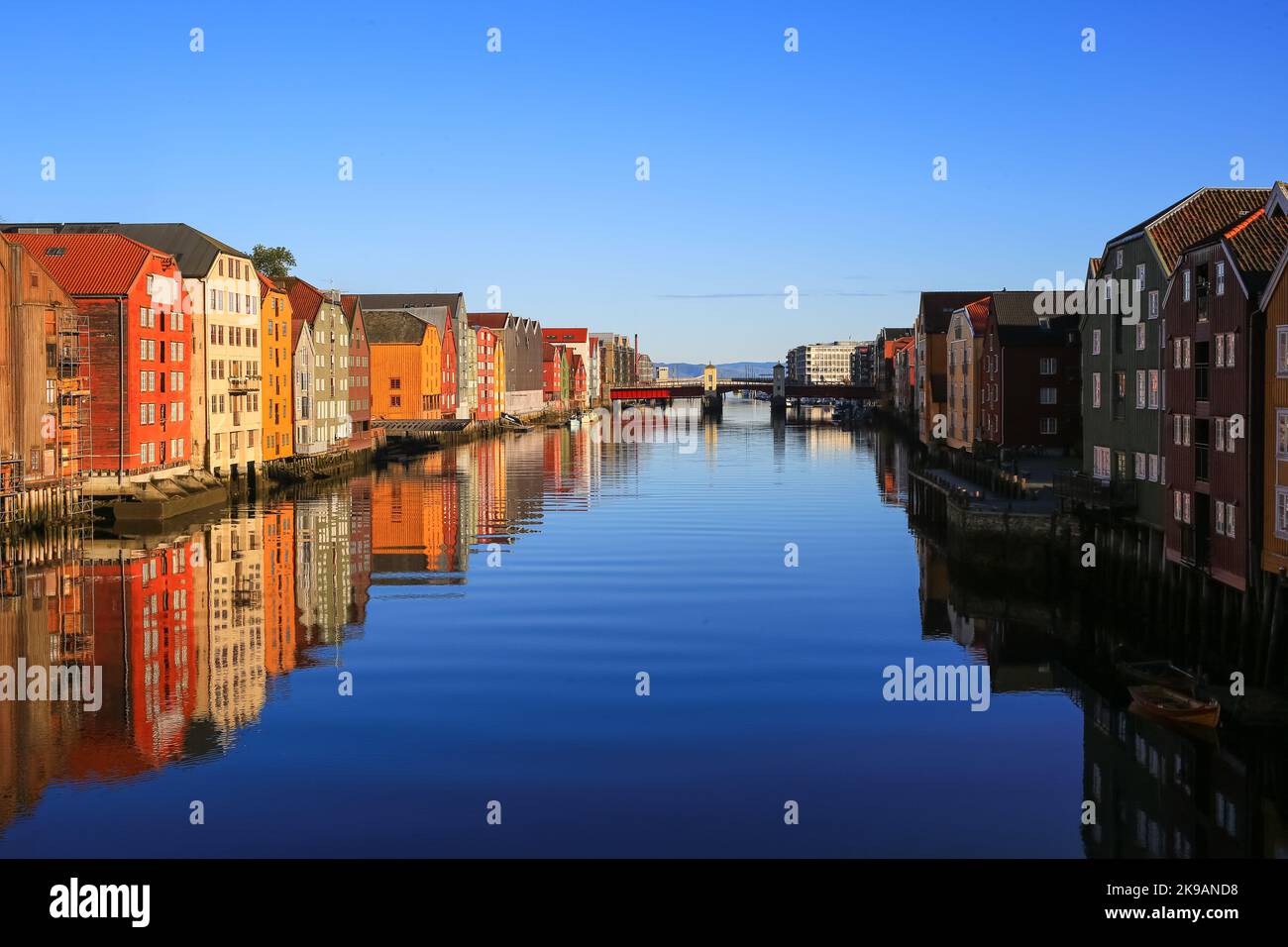 Indian summer in Trondheim, view of the river Nidelva , historical ...