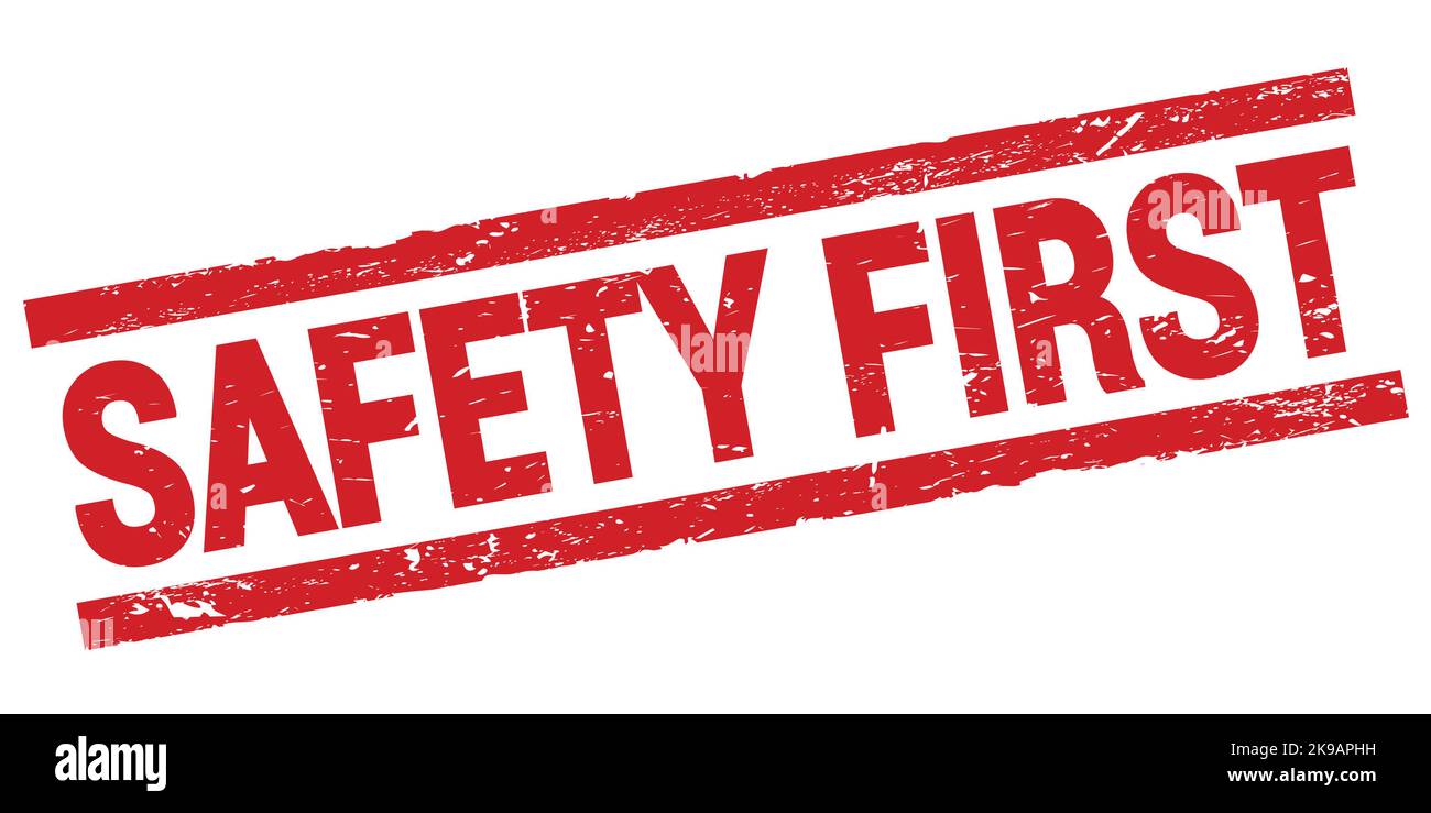 SAFETY FIRST text written on red rectangle stamp sign Stock Photo - Alamy
