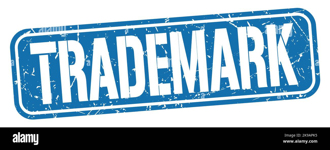 TRADEMARK text written on blue grungy stamp sign Stock Photo - Alamy