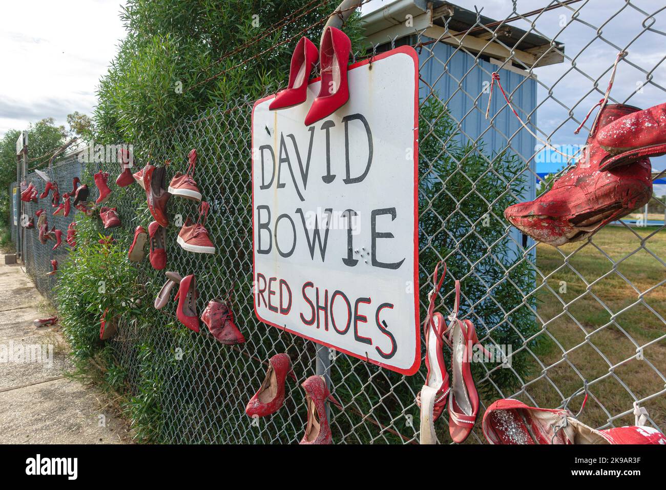 The David Bowie Red Shoes memorial / artwork on a fence at the swimming ...