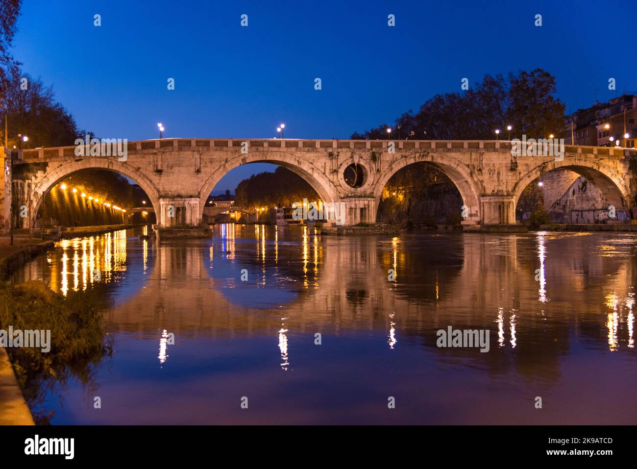 Rome (Italy) - The Tiber river and the monumental Lungotevere at sunset ...