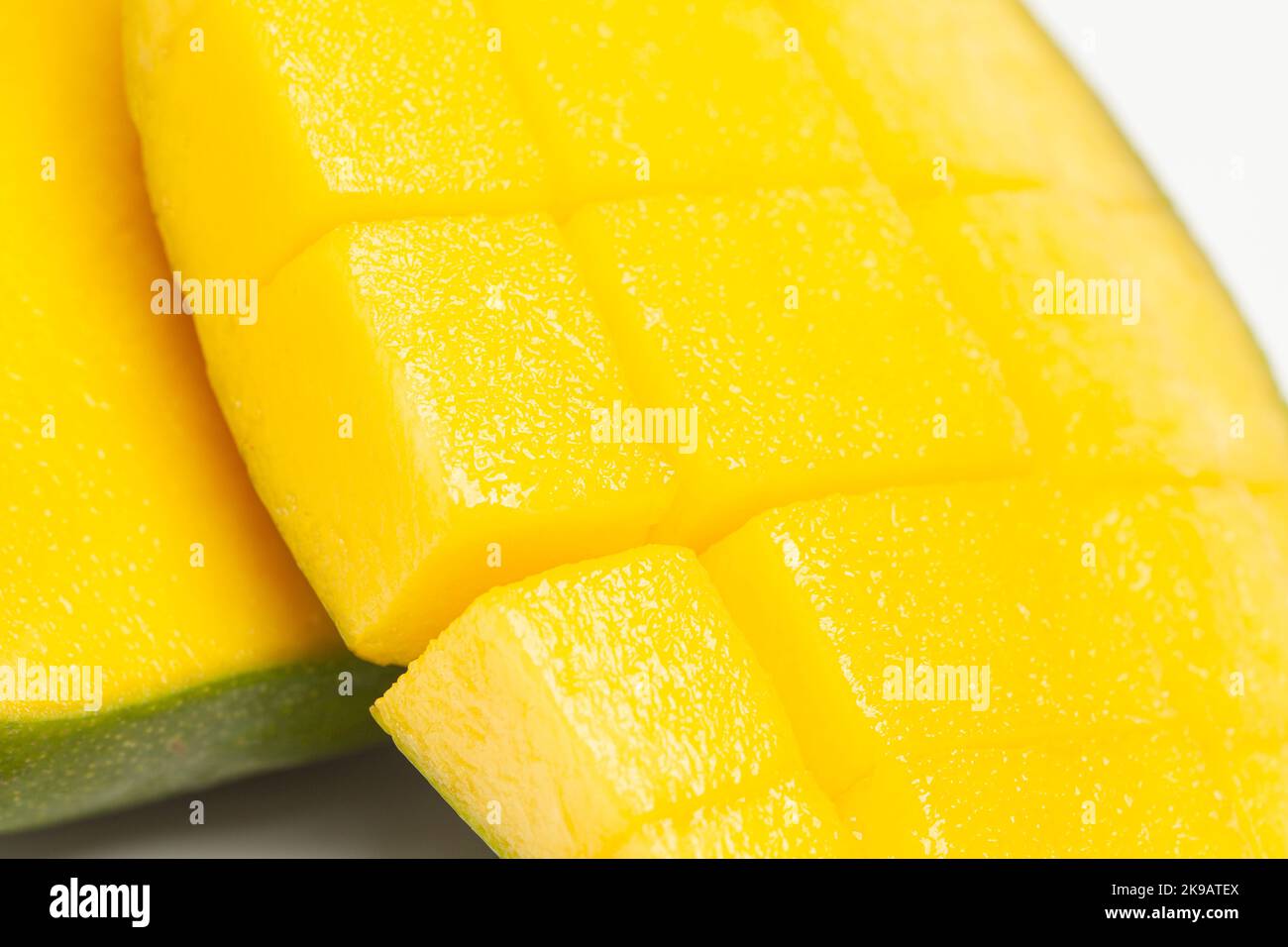 chopped half of ripe mango fruit texture background close-up Stock ...