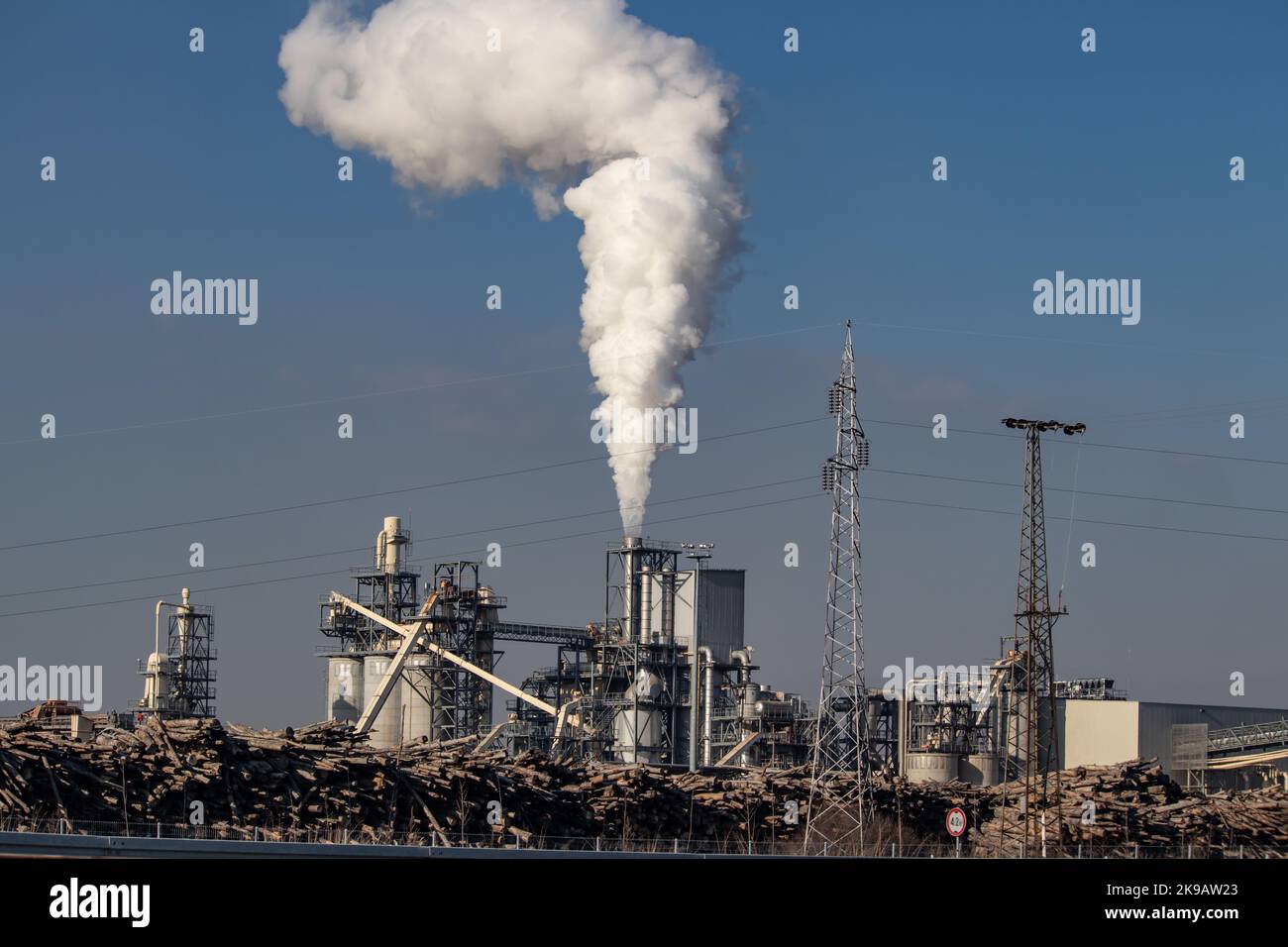City pollution mixed with morning fog, industrial chimneys around ...