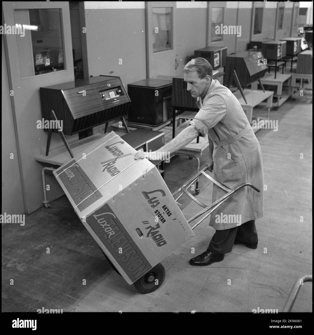 Manufacturing room. Radio and TV appliances. Box with the text is ...