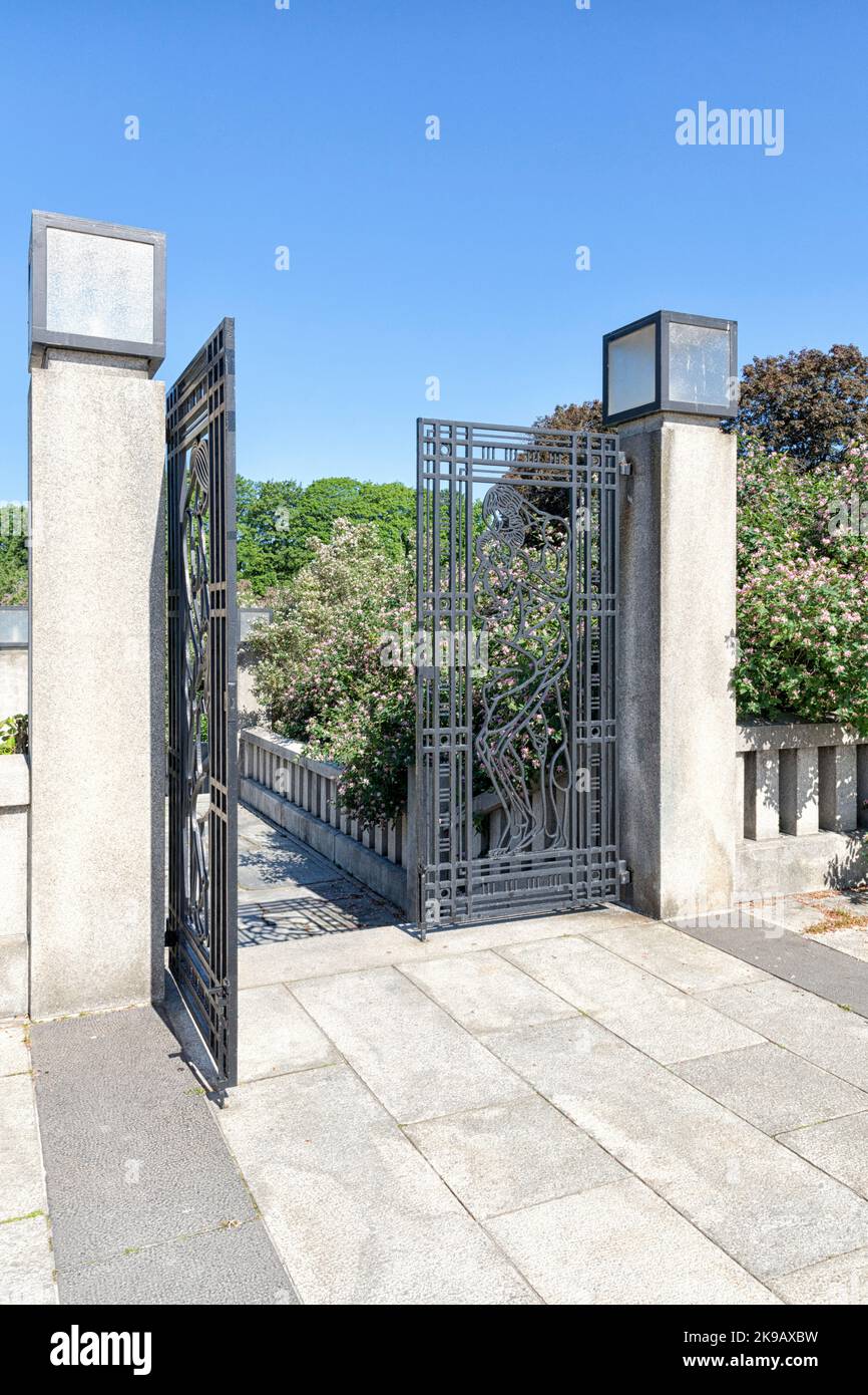 A half-open wrought iron gate leads down from the Monolith Plareau to ...