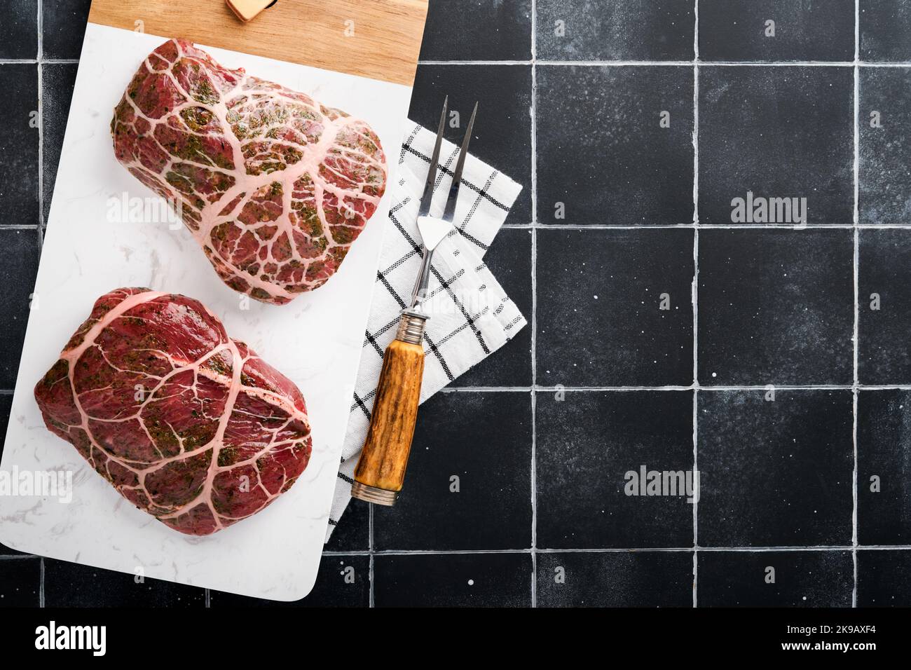 Steaks Raw. Raw cowboy steak, marbled beef meat with spices rosemary ...