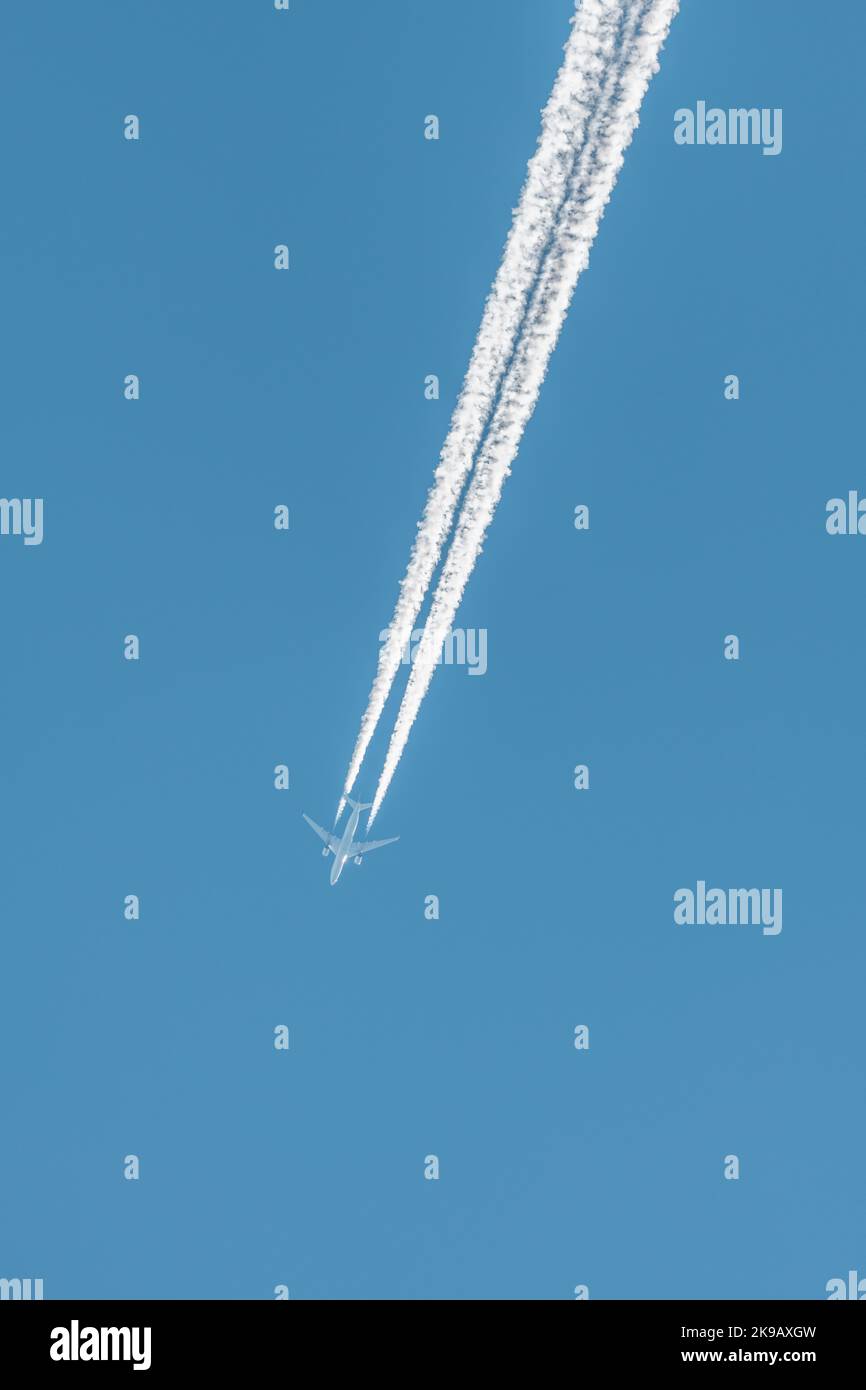 Airliners in flight in a blue sky in late summer. France Stock Photo ...