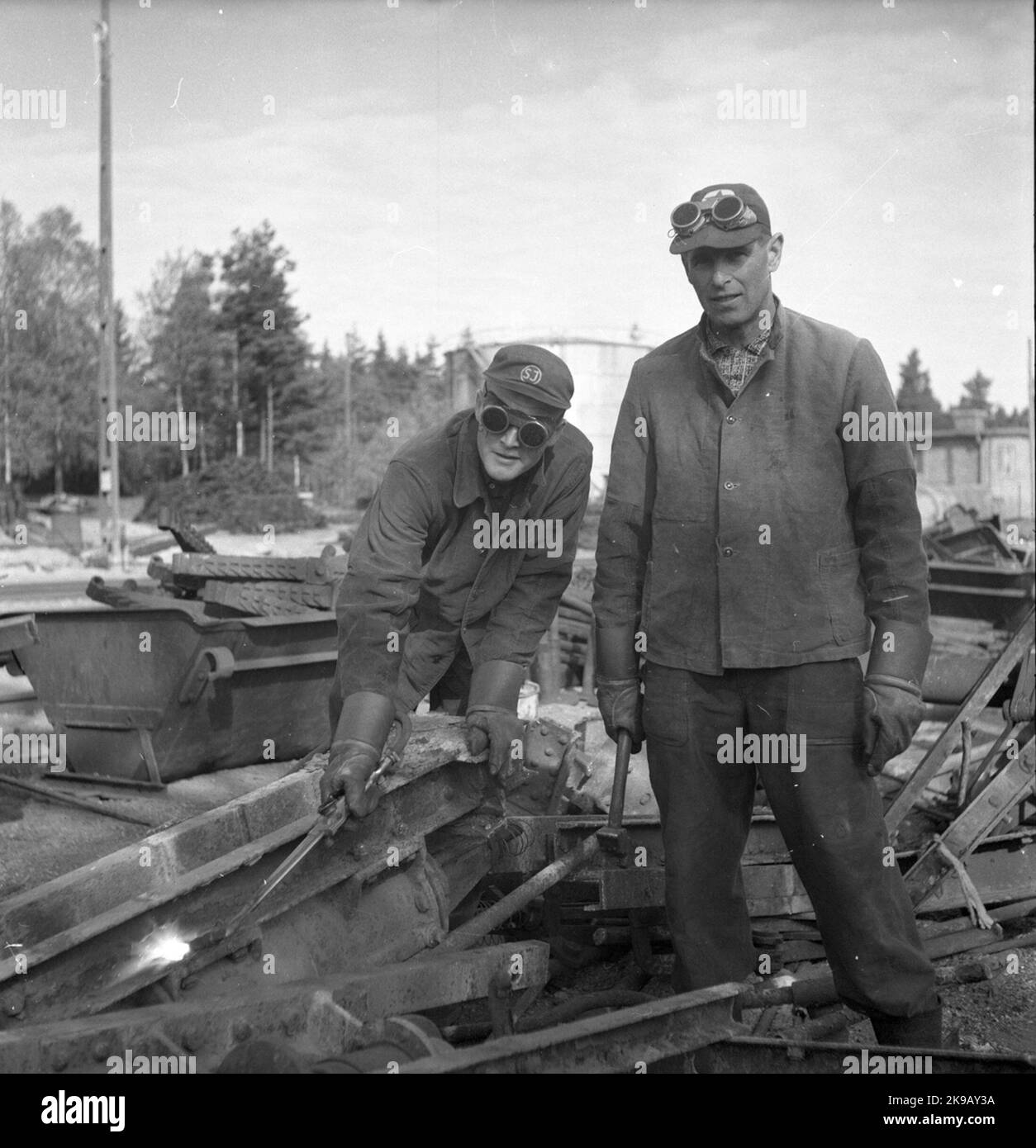 Scrap site in Vislanda. Many old steam locomotives, passenger cars ...