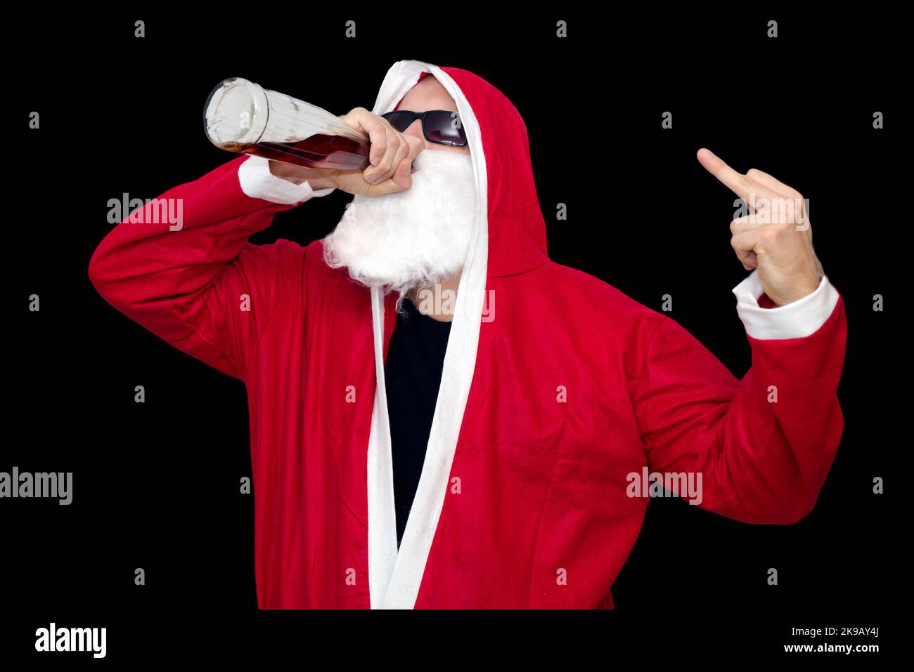 Bad Santa Claus with bottle of alcohol on black backround with middle ...
