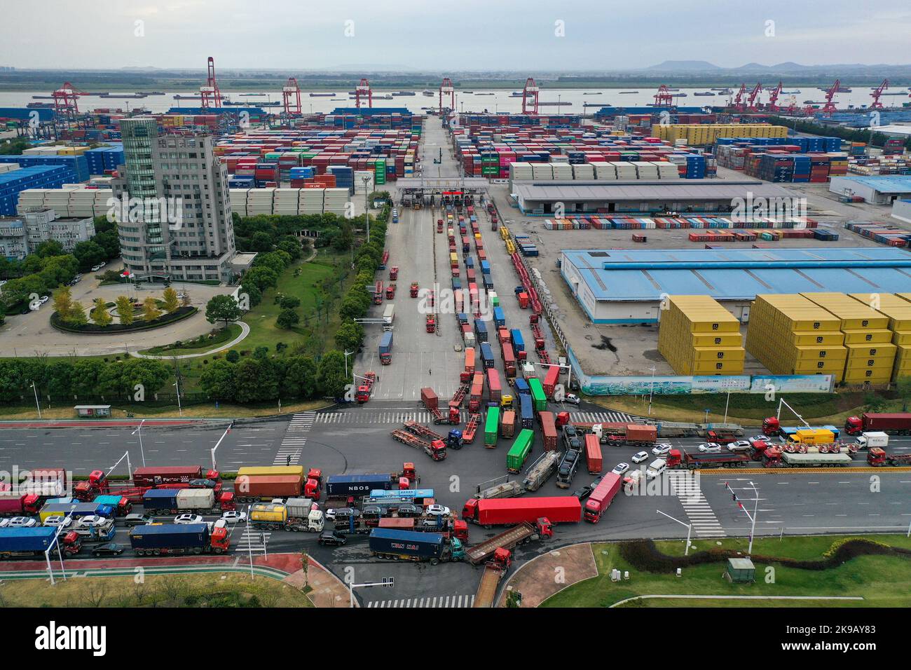 NANJING, CHINA - OCTOBER 27, 2022 - Aerial photo shows container trucks ...