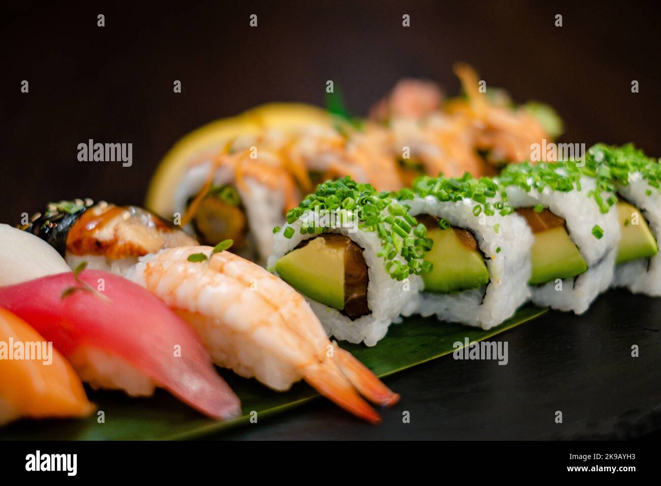 Sushi and Maki on plates Stock Photo - Alamy