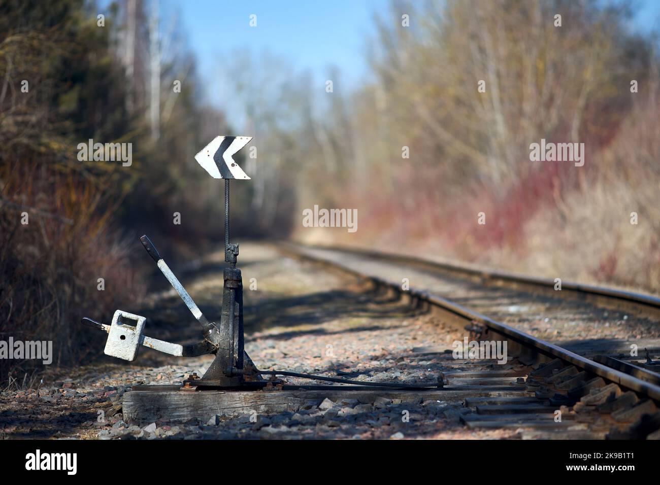 Hand-operated railroad switch with lever signal weight. Old railroad ...