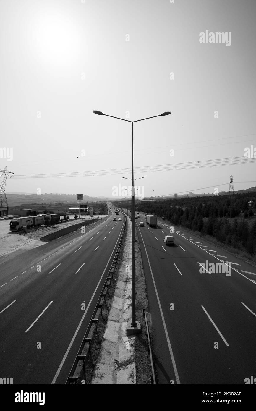 Car driving fast on road Black and White Stock Photos & Images - Alamy