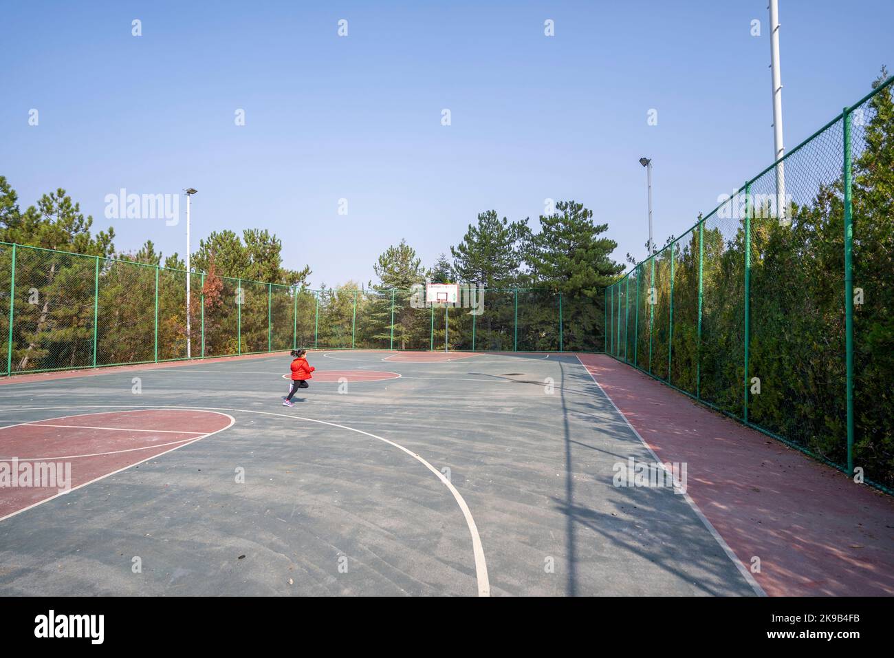 Basketball court in autumn Stock Photo - Alamy