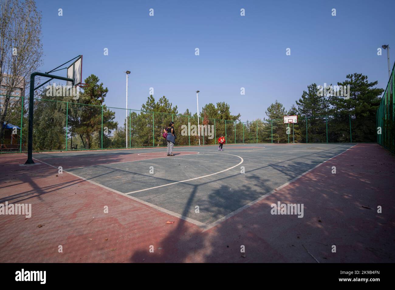 Basketball court in autumn Stock Photo - Alamy