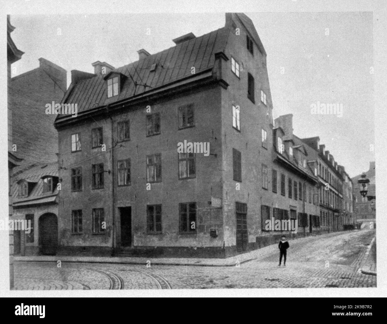 Residential building at intersection with tramway to the left in the ...