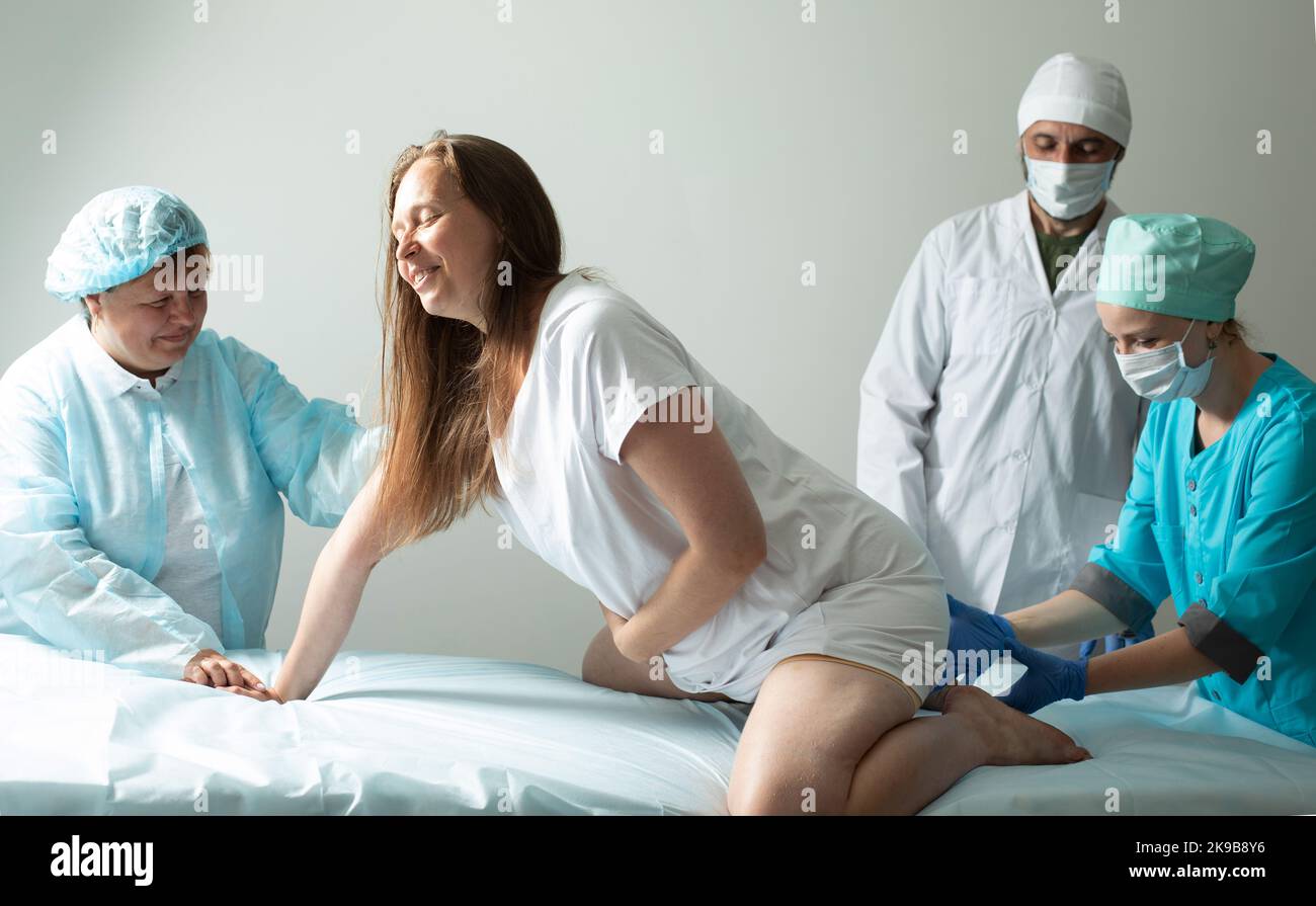 Child birth process, helping personal during labour Stock Photo - Alamy Child birth process, helping personal during labour Stock Photo - Alamy