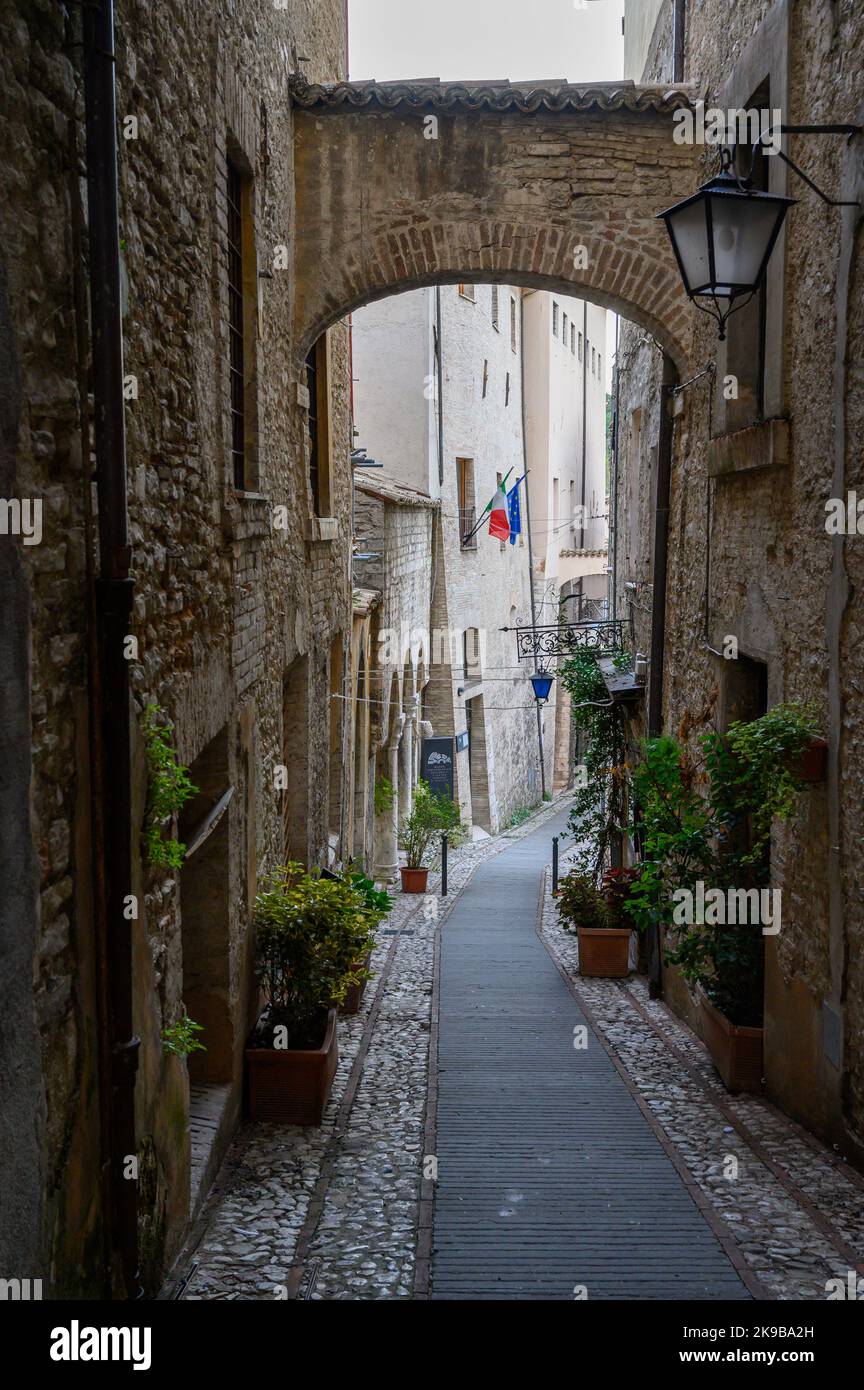 A typical street scene in old town Spoleto with traditional stone ...