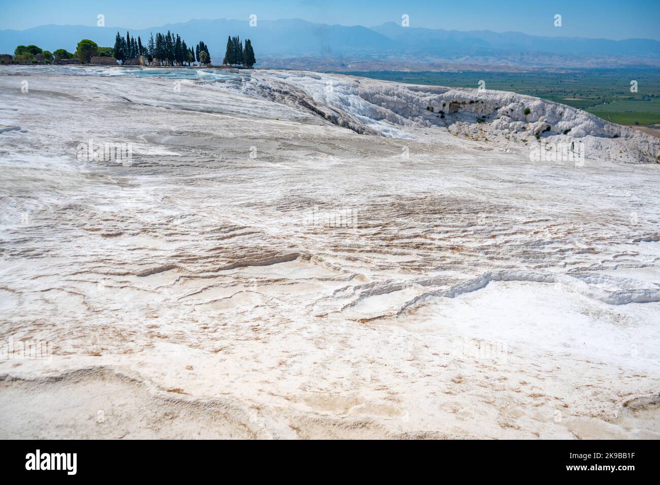 Calcite cliff of Pamukkale, white travertines in Turkey Stock Photo - Alamy
