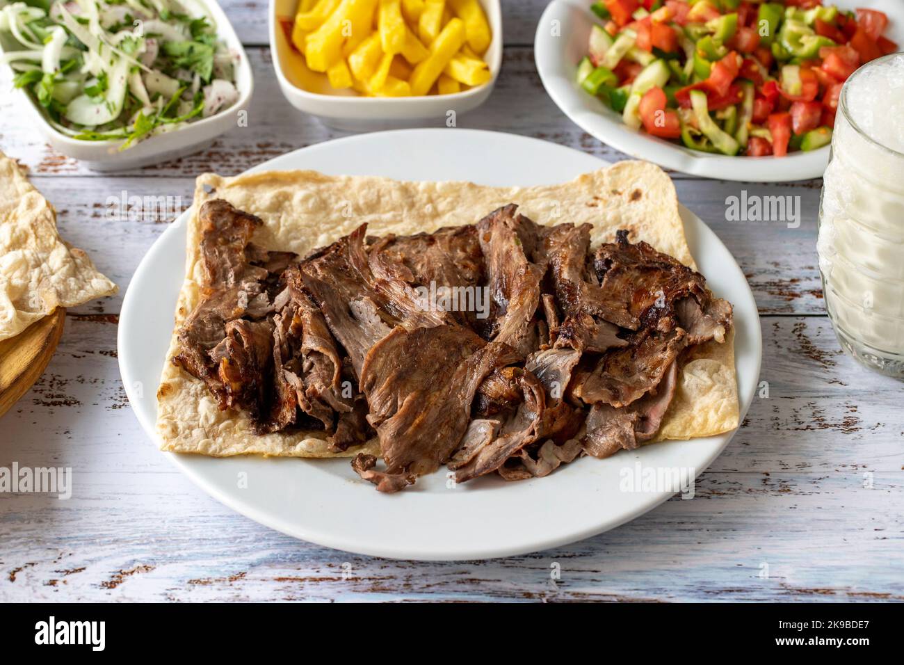 Turkish meat doner on wood background. Traditional flavors. Doner kebab ...