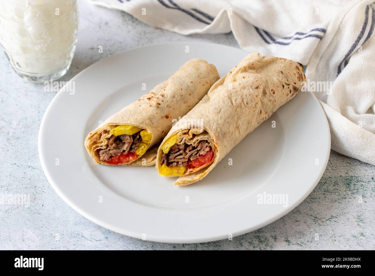 Turkish meat doner wrap on gray background. Traditional flavors. Doner ...