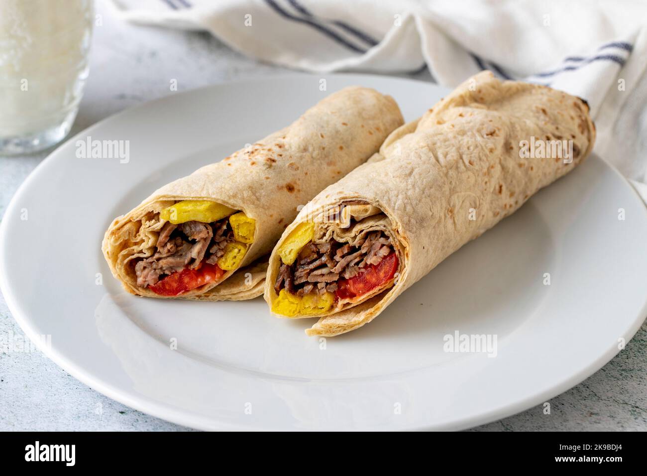 Turkish meat doner wrap on gray background. Traditional flavors. Doner ...
