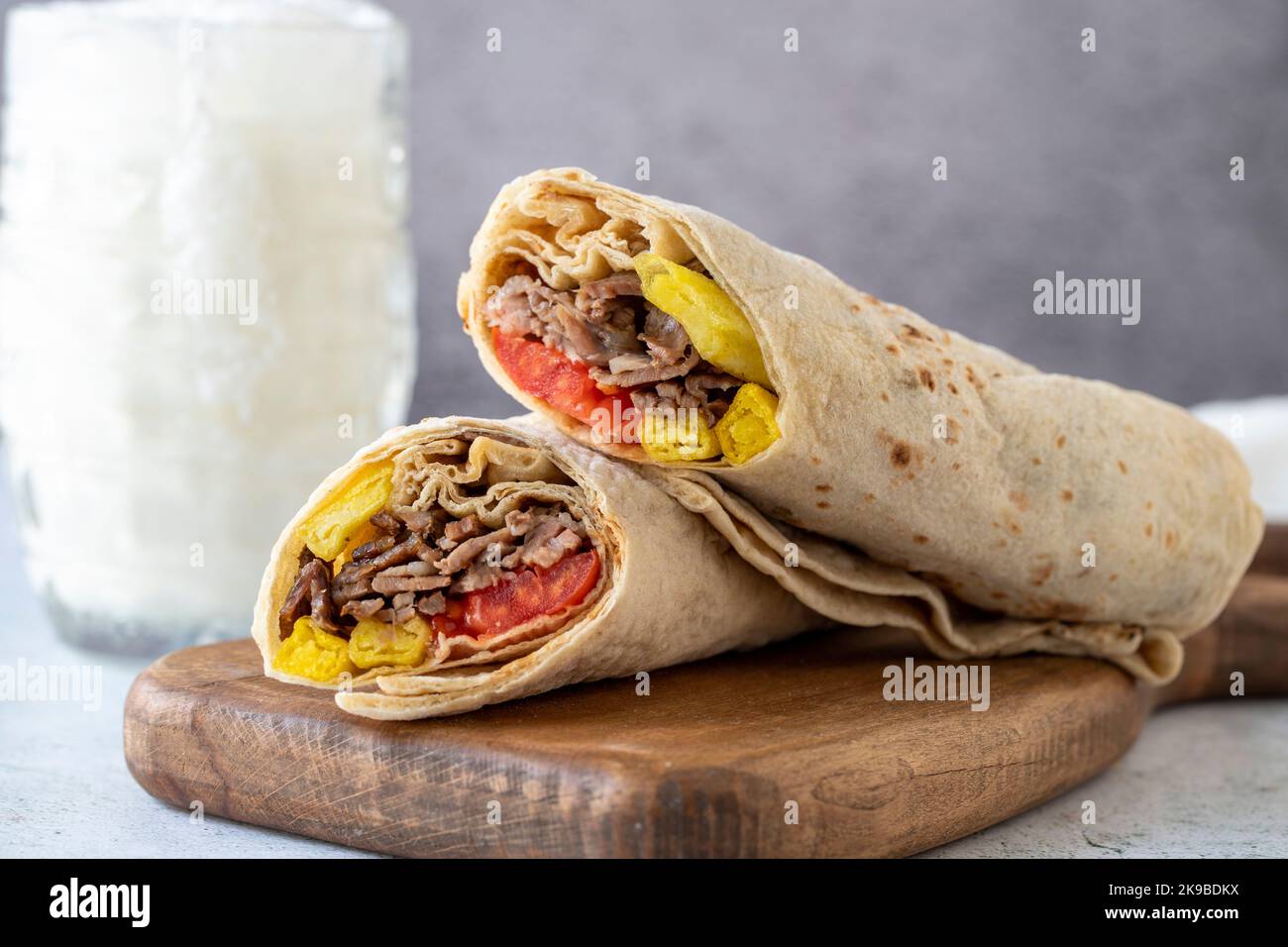 Turkish meat doner wrap on gray background. Traditional flavors. Doner ...