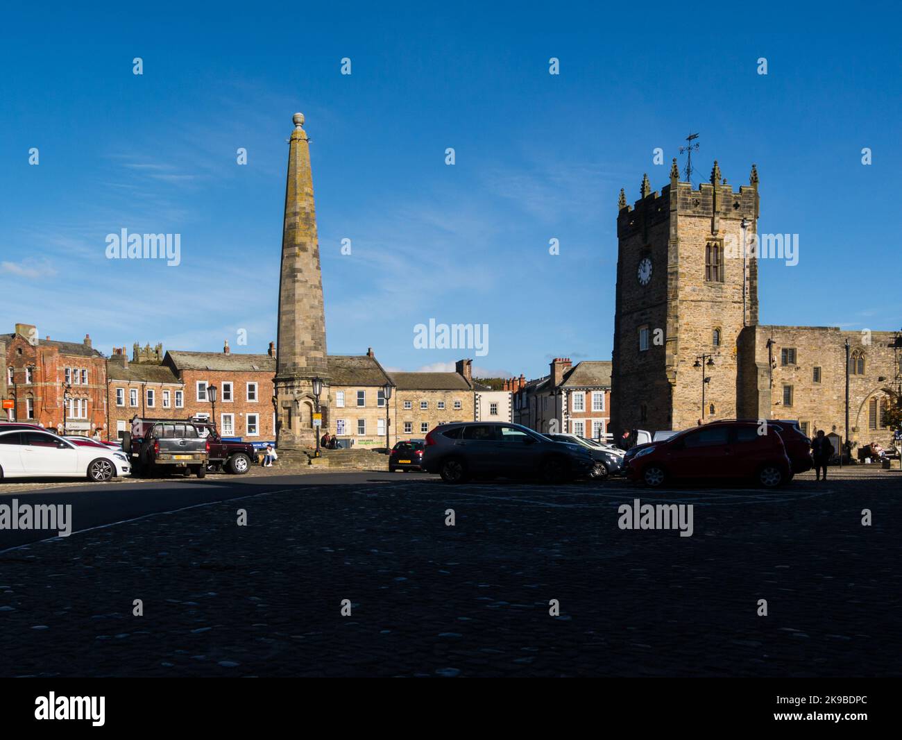 Stone obelisk and Methodist Church in historic market Place of Richmond ...