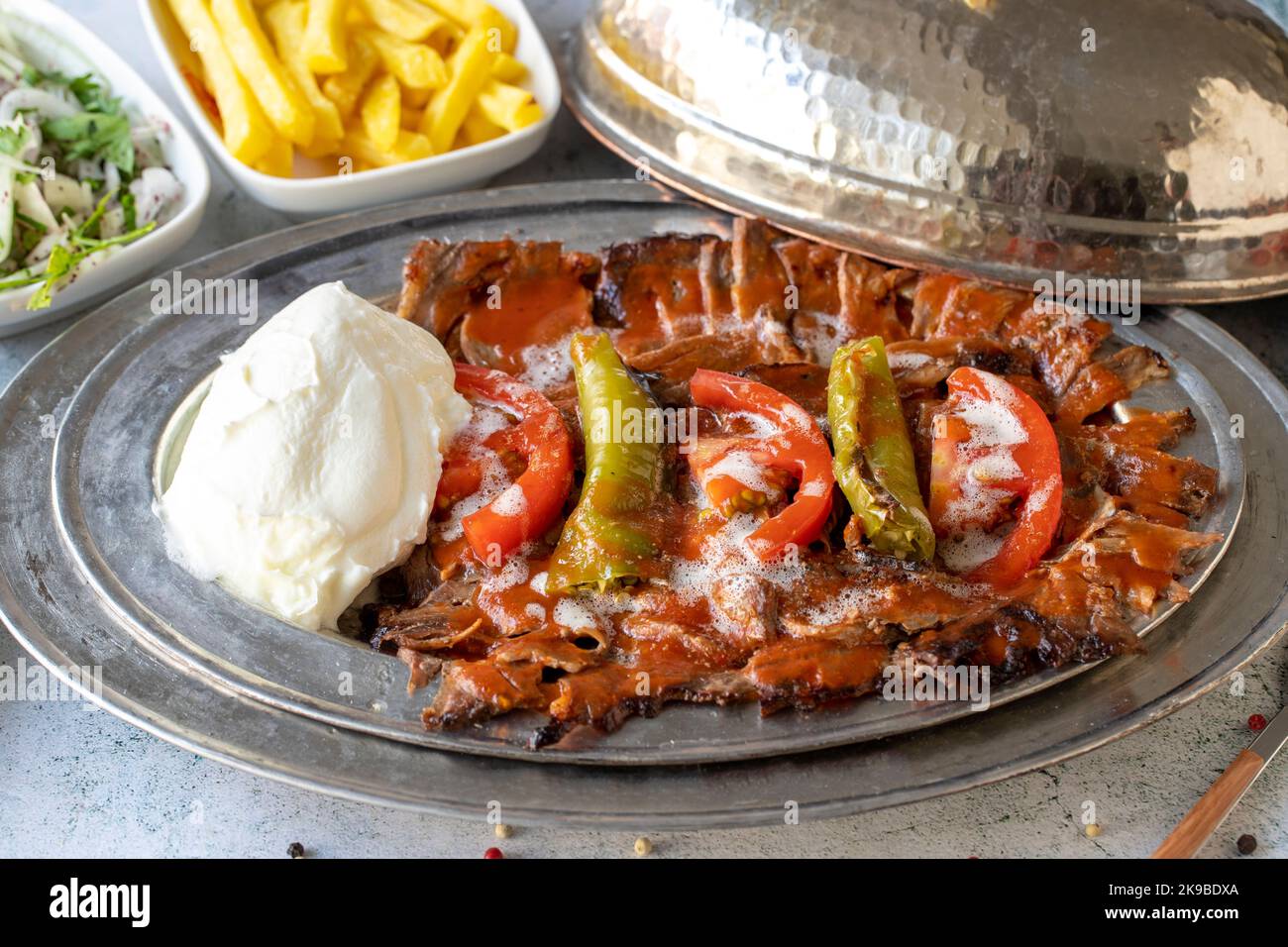 Turkish iskender kebab on gray background. Traditional flavors. Doner ...