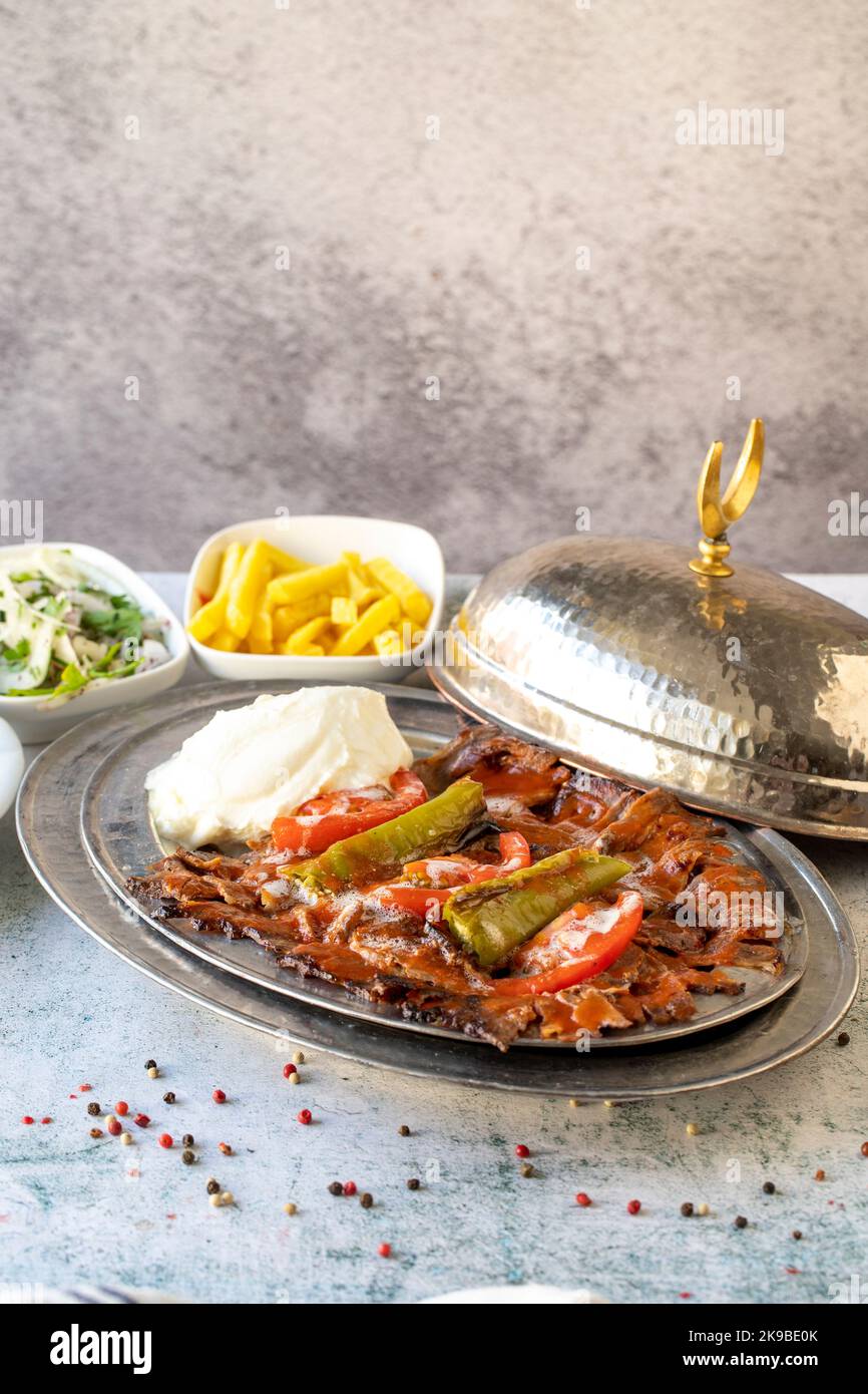 Turkish iskender kebab on gray background. Traditional flavors. Doner ...