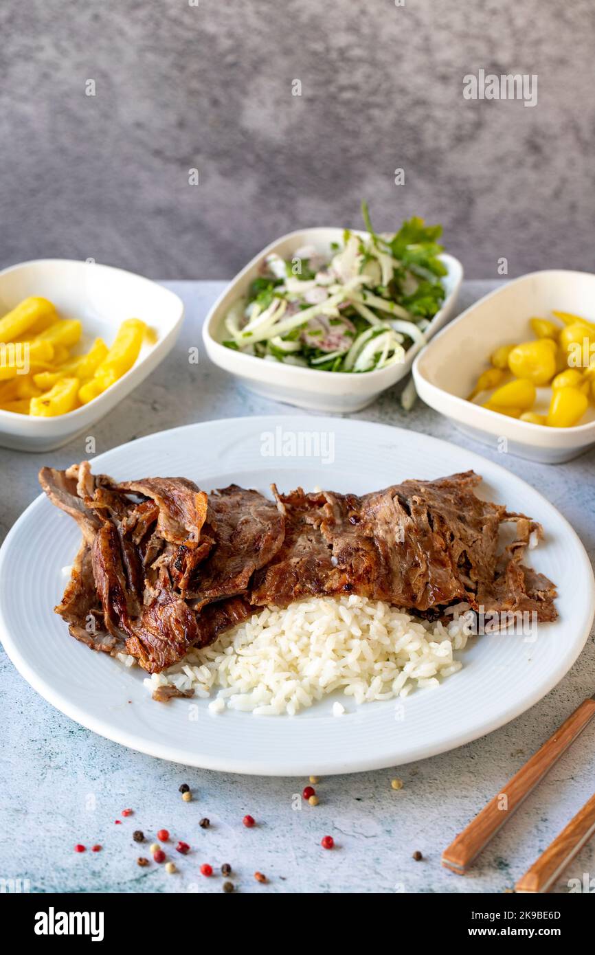 Meat doner with rice on gray background. Traditional flavors. Doner ...