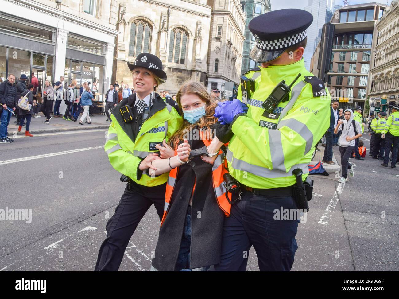 London, England, UK. 27th Oct, 2022. Police officers arrest a protester ...