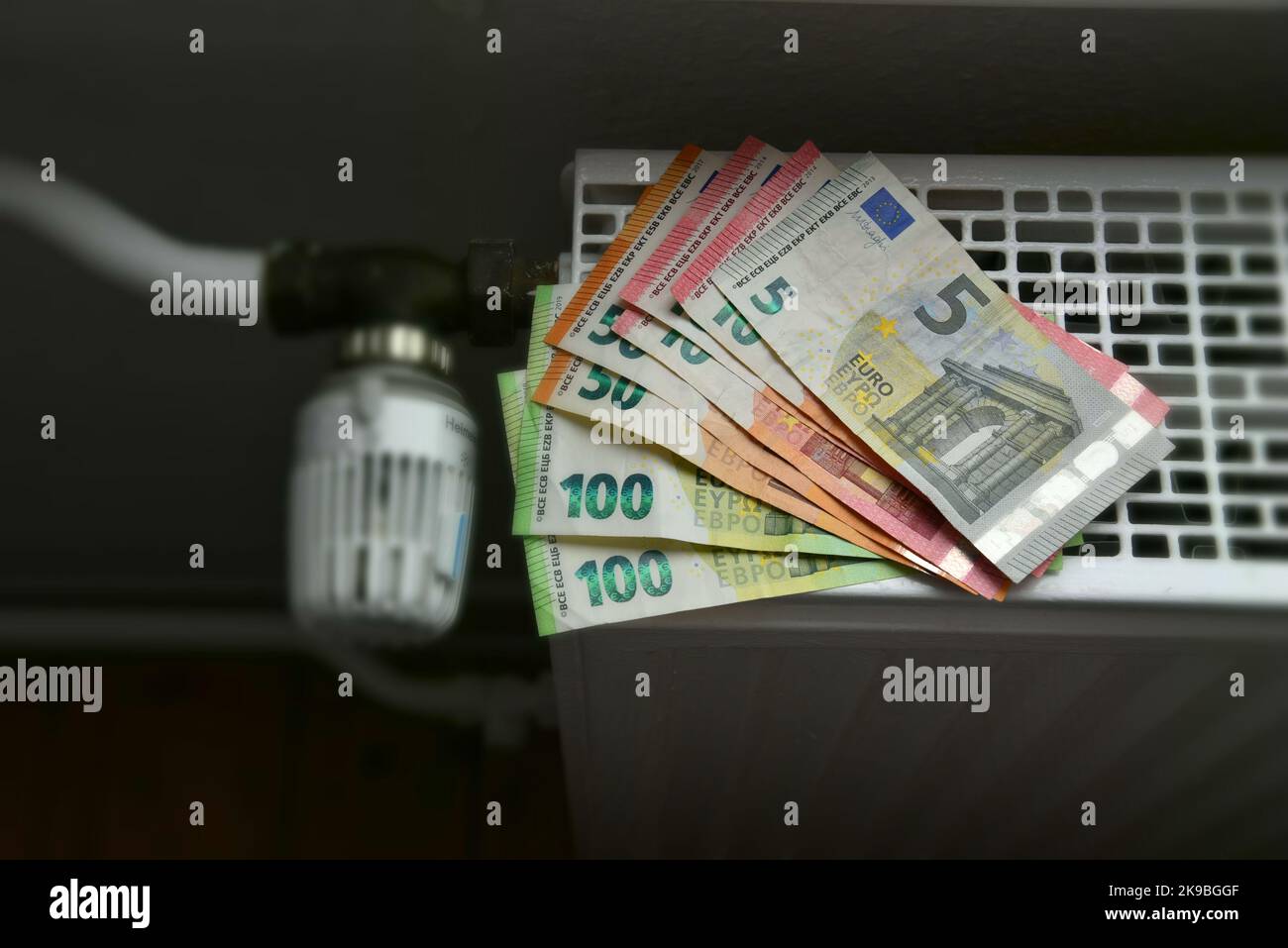 euro bank notes on a heater Stock Photo - Alamy