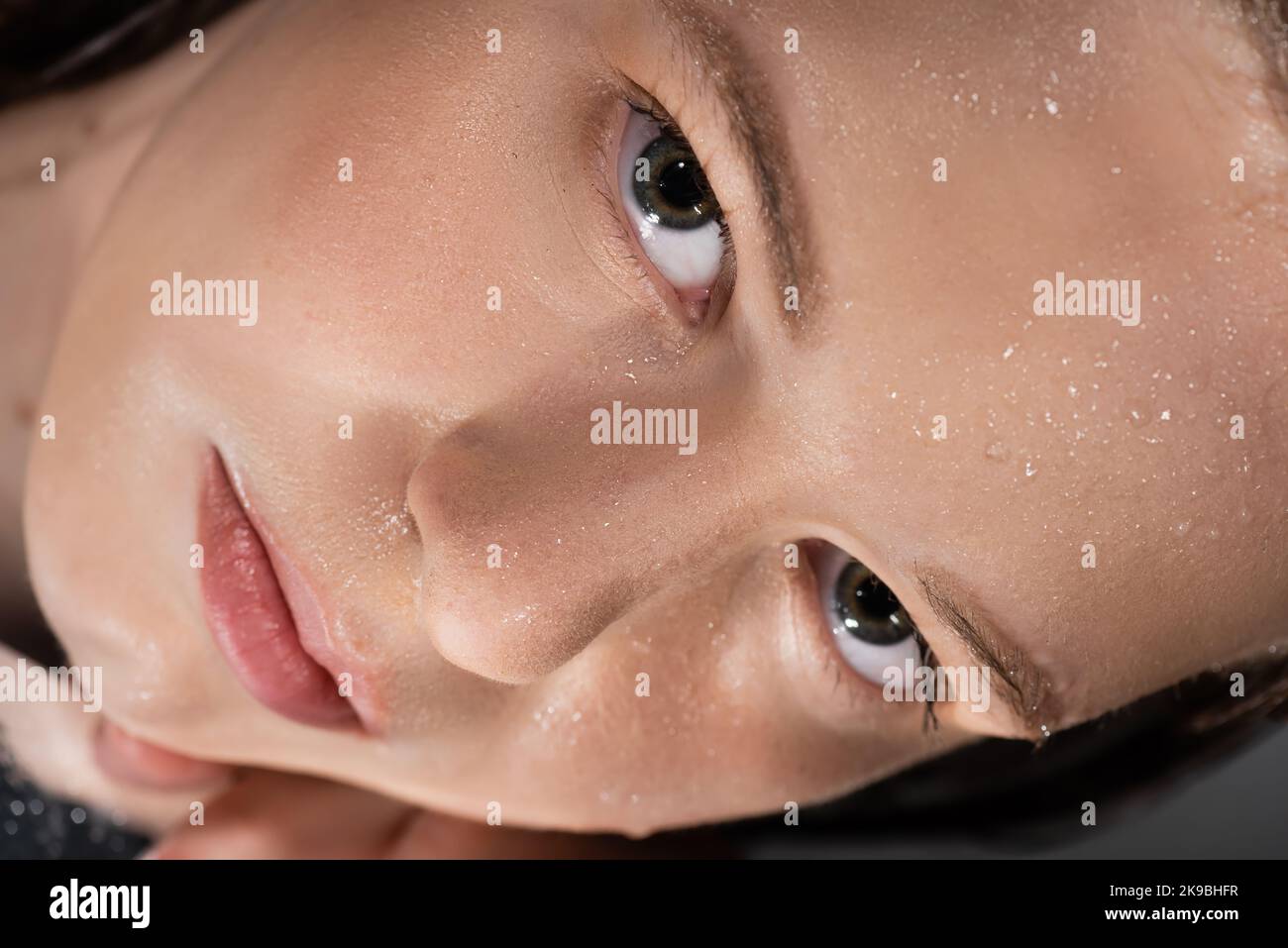Close up beautiful wet woman face hi-res stock photography and images ...