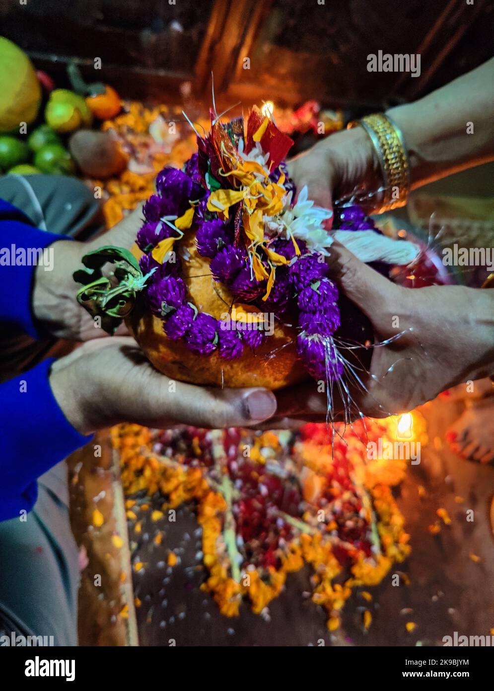 Kathmandu, Bagmati, Nepal. 27th Oct, 2022. A man receives offerings ...