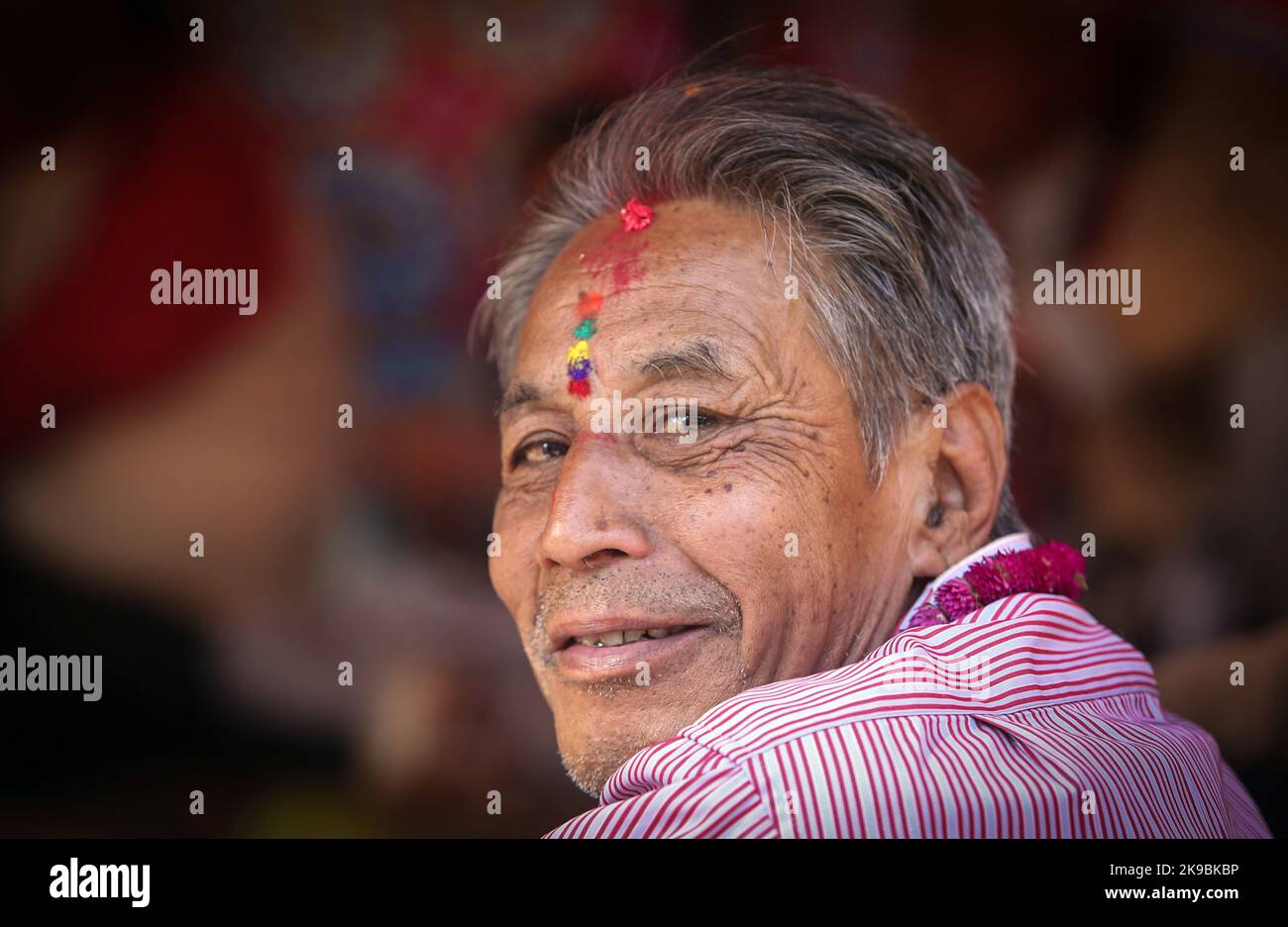 Kathmandu, Bagmati, Nepal. 27th Oct, 2022. A man smiles after receiving ...