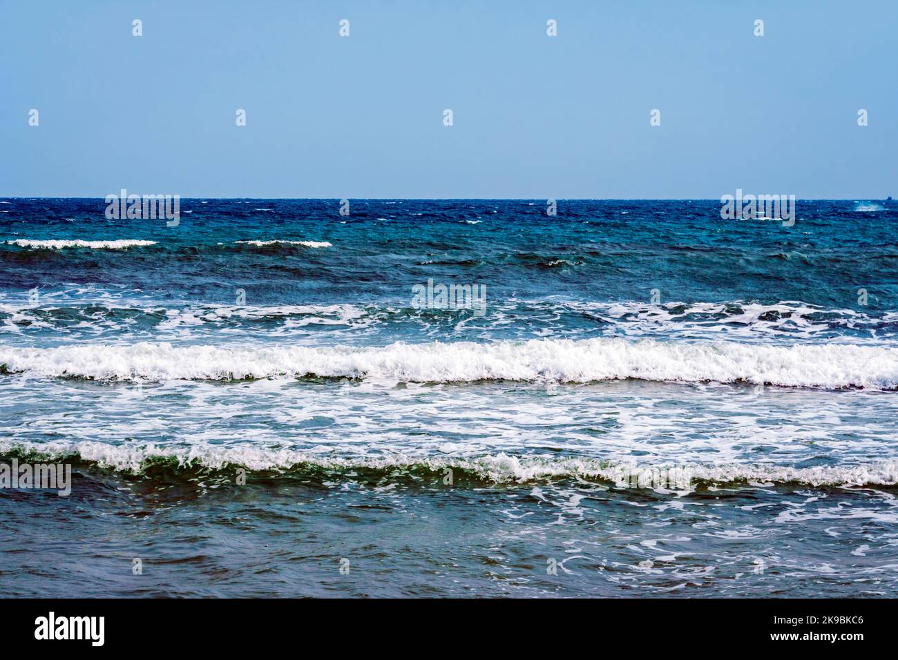 Ocean waves. Indian ocean. Bali. Indonesia. the horizon line separating ...