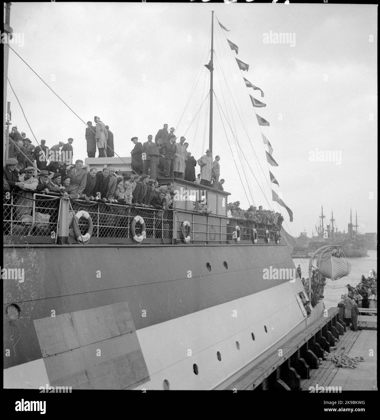 Danish refugees on their way home, aboard the train ferry Malmö. Here ...