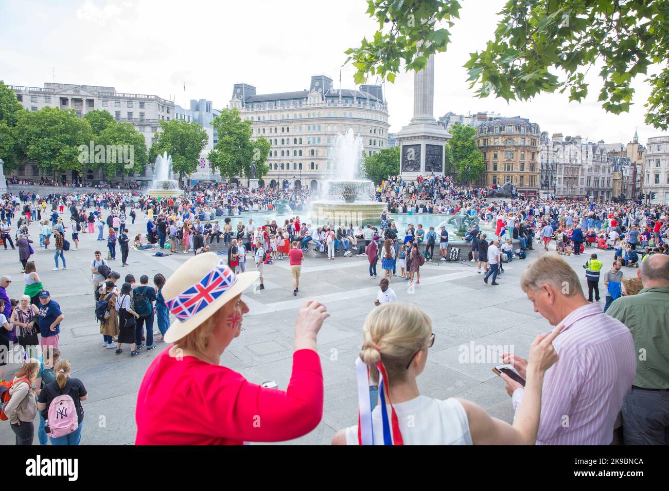 Revellers with Union flags gather in Trafalgar Square, central London ...