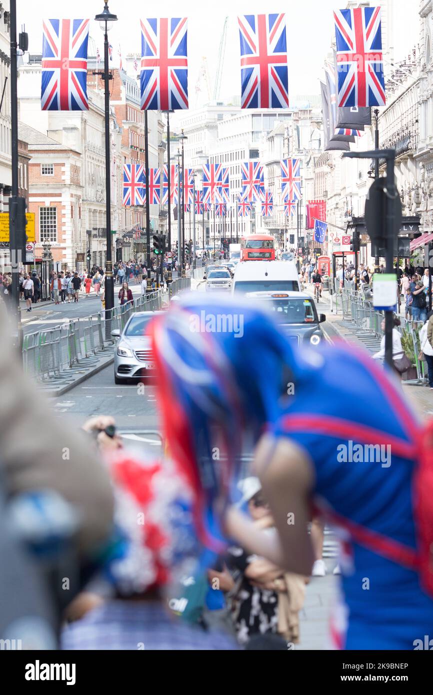 Revellers in Union Jack-themed costumes gather in Piccadilly Circus ...