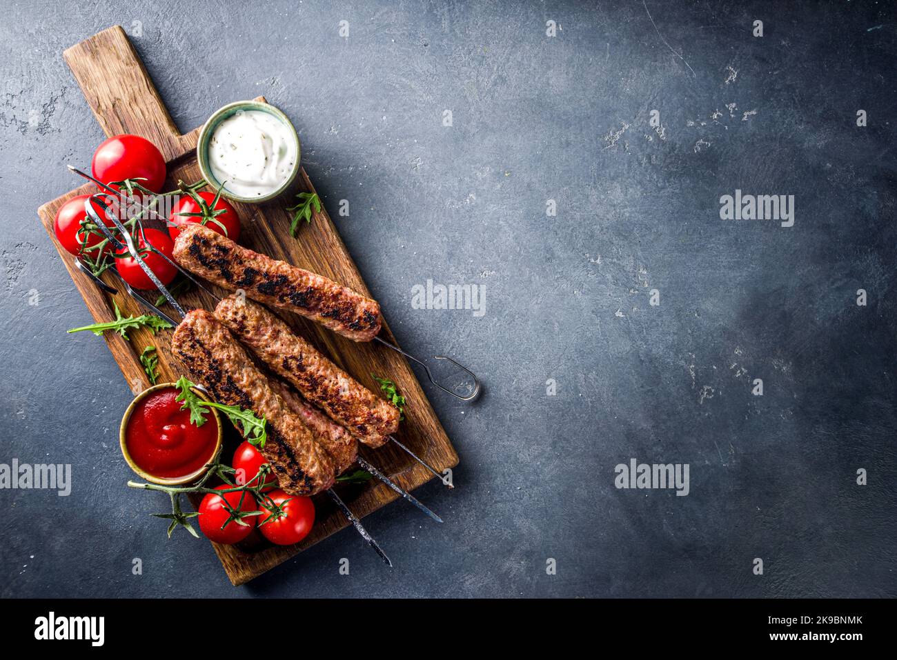 Shish kebab on skewers, from minced beef meat. Lula kebab, traditional ...
