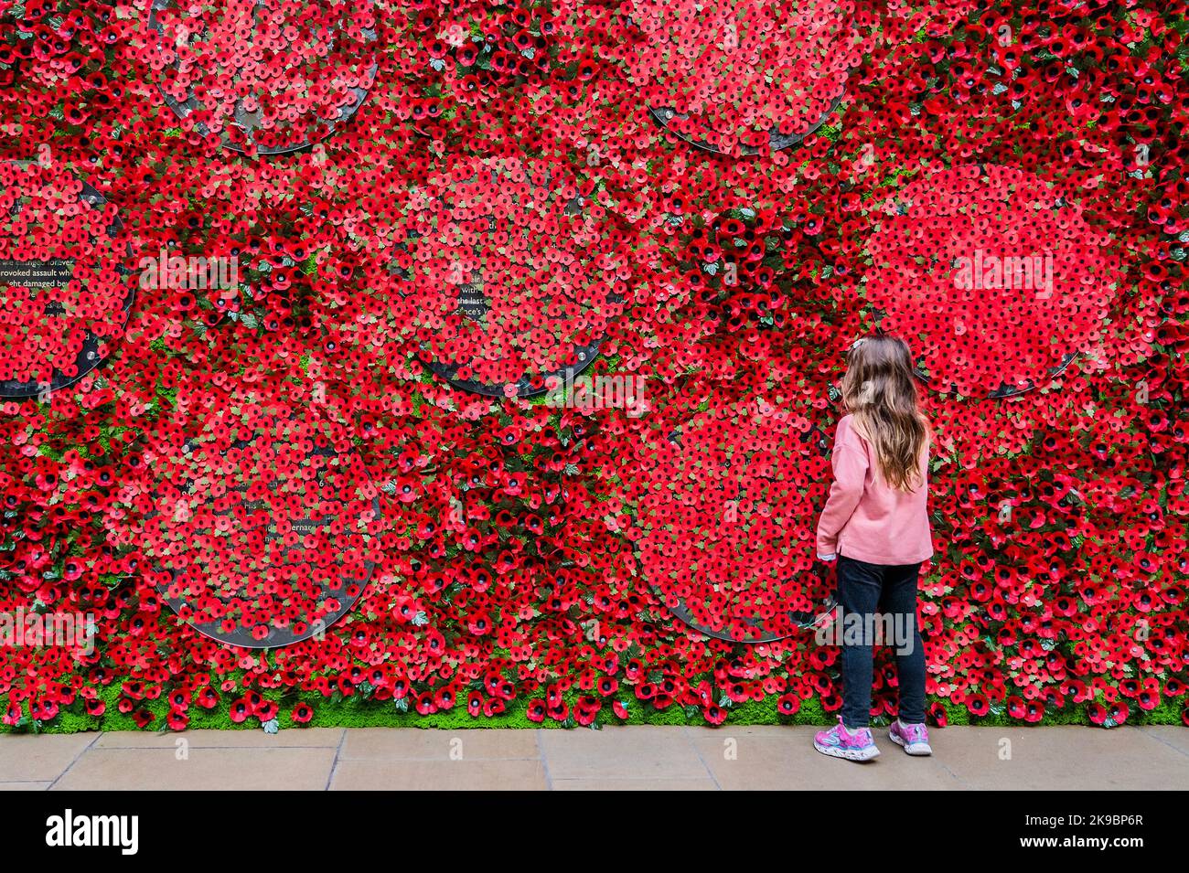 London, UK. 27 Oct 2022. Visitors of all ages Enjoy peeling off the ...