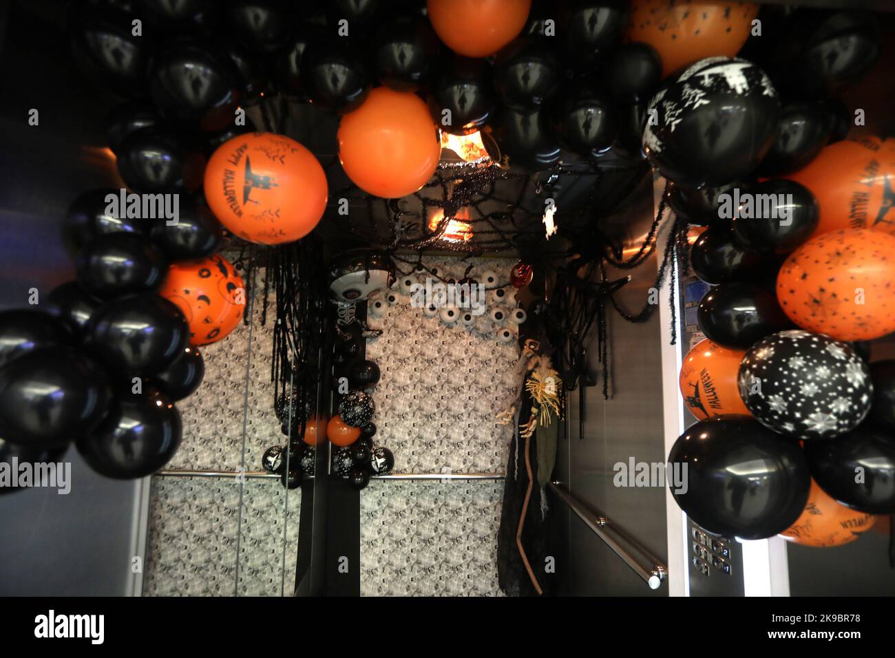 The elevator for customers in the Tower Center shopping mall decorated ...