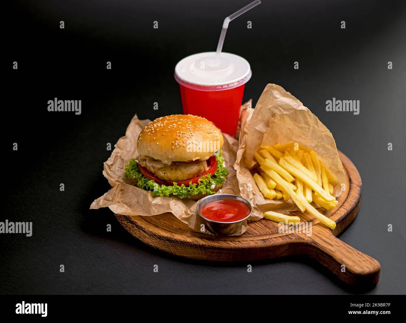 Classic burgers with becon, meat, cheese, onion, tomato and cheese and ...