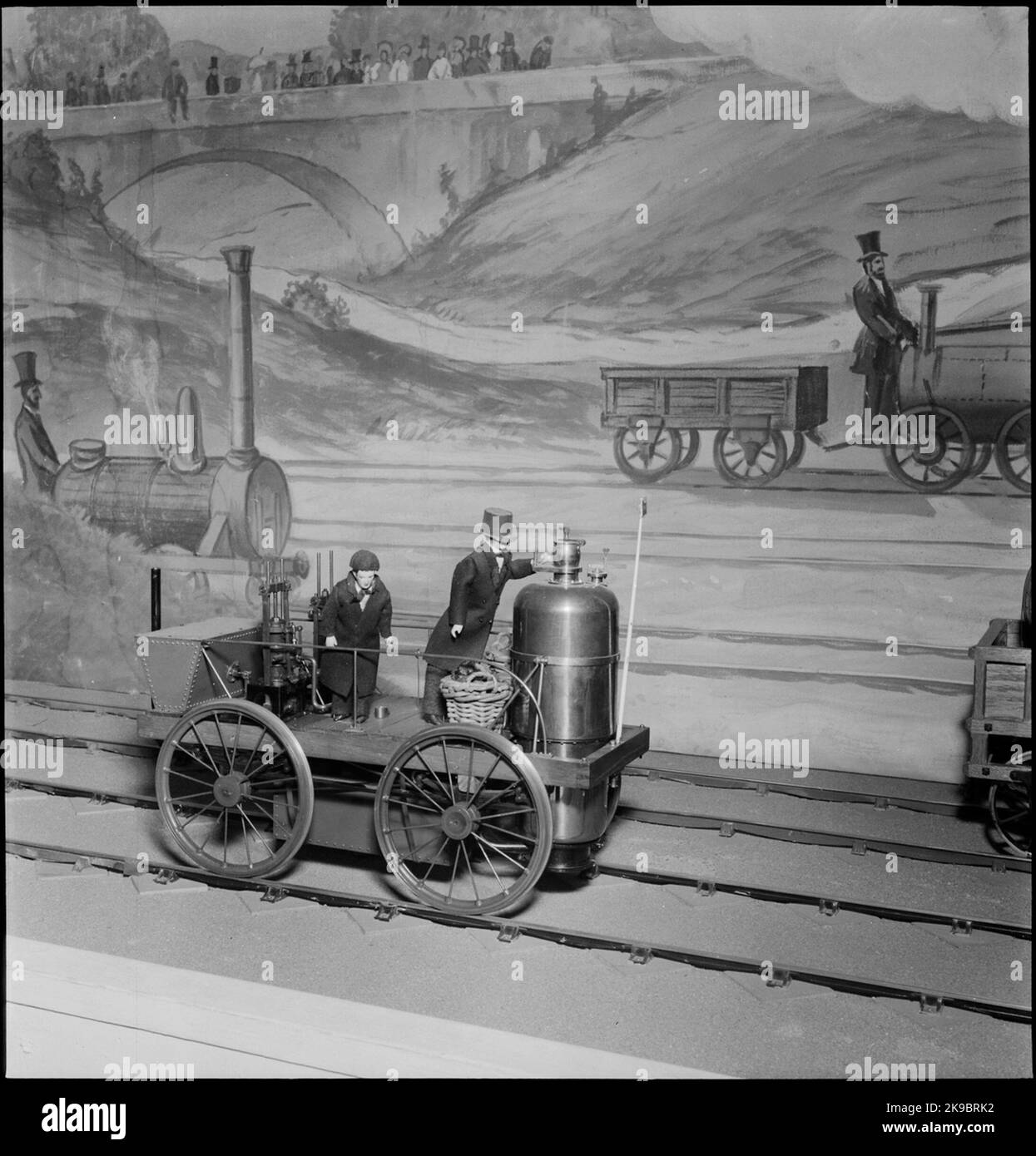 Model of novelty in front of painting depicting Rainhall Stock Photo ...