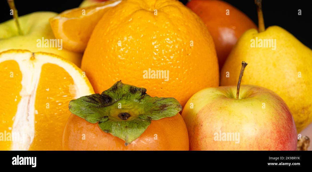 Fruits of orange and yellow colors - apples, persimmons, pears and ...