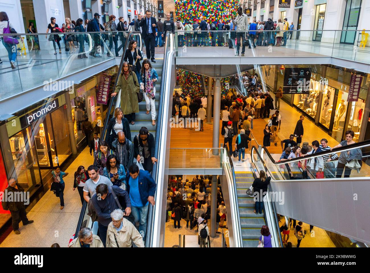 People using escalators inside large hi-res stock photography and ...