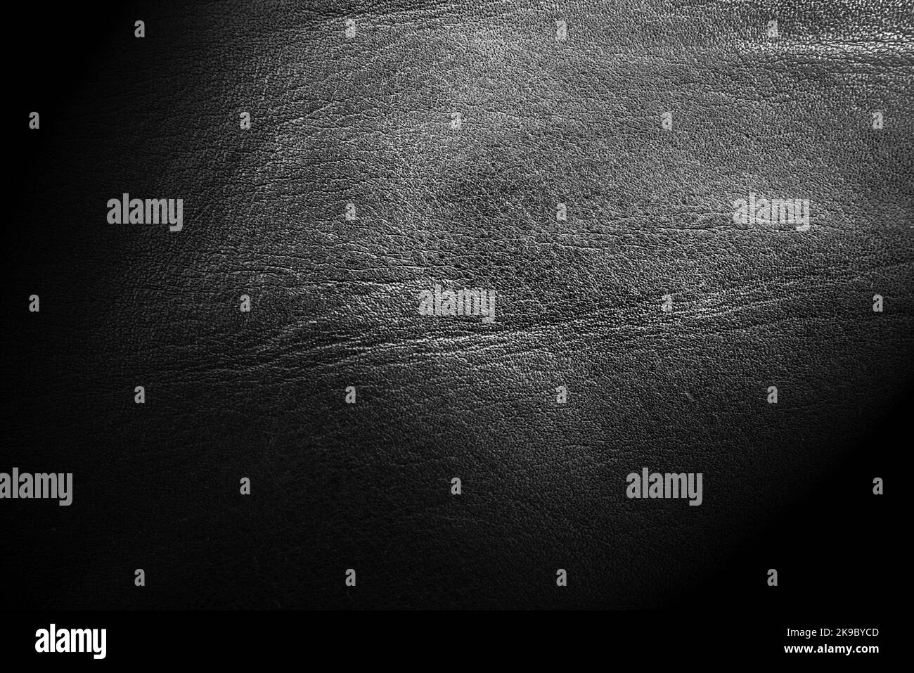 Black leather texture. Abstract background of dark leather with small ...
