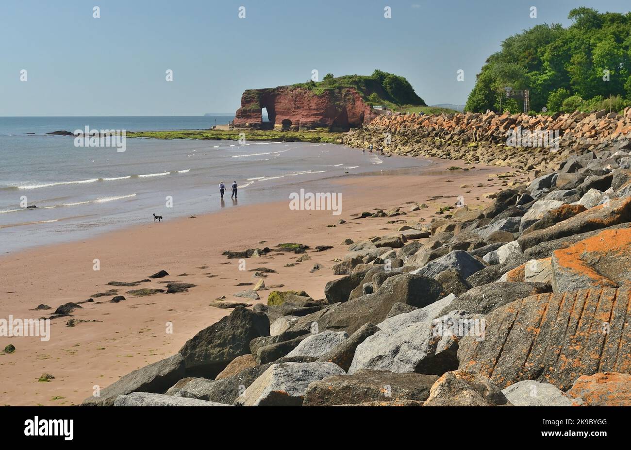 Langstone Rock and rock armour along the seawall at Dawlish Warren ...